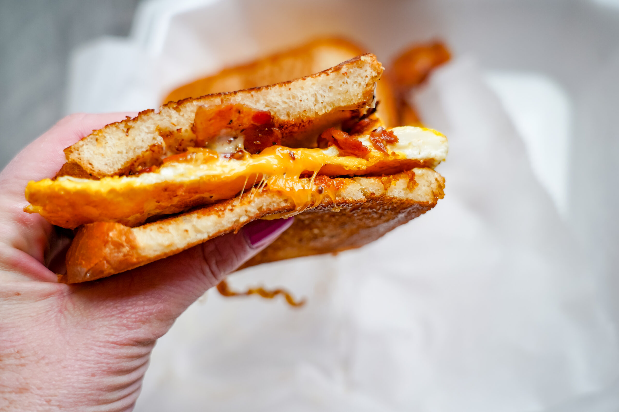 A magical breakfast sandwich from Devine Cinnamon Roll Deli in Columbia, SC